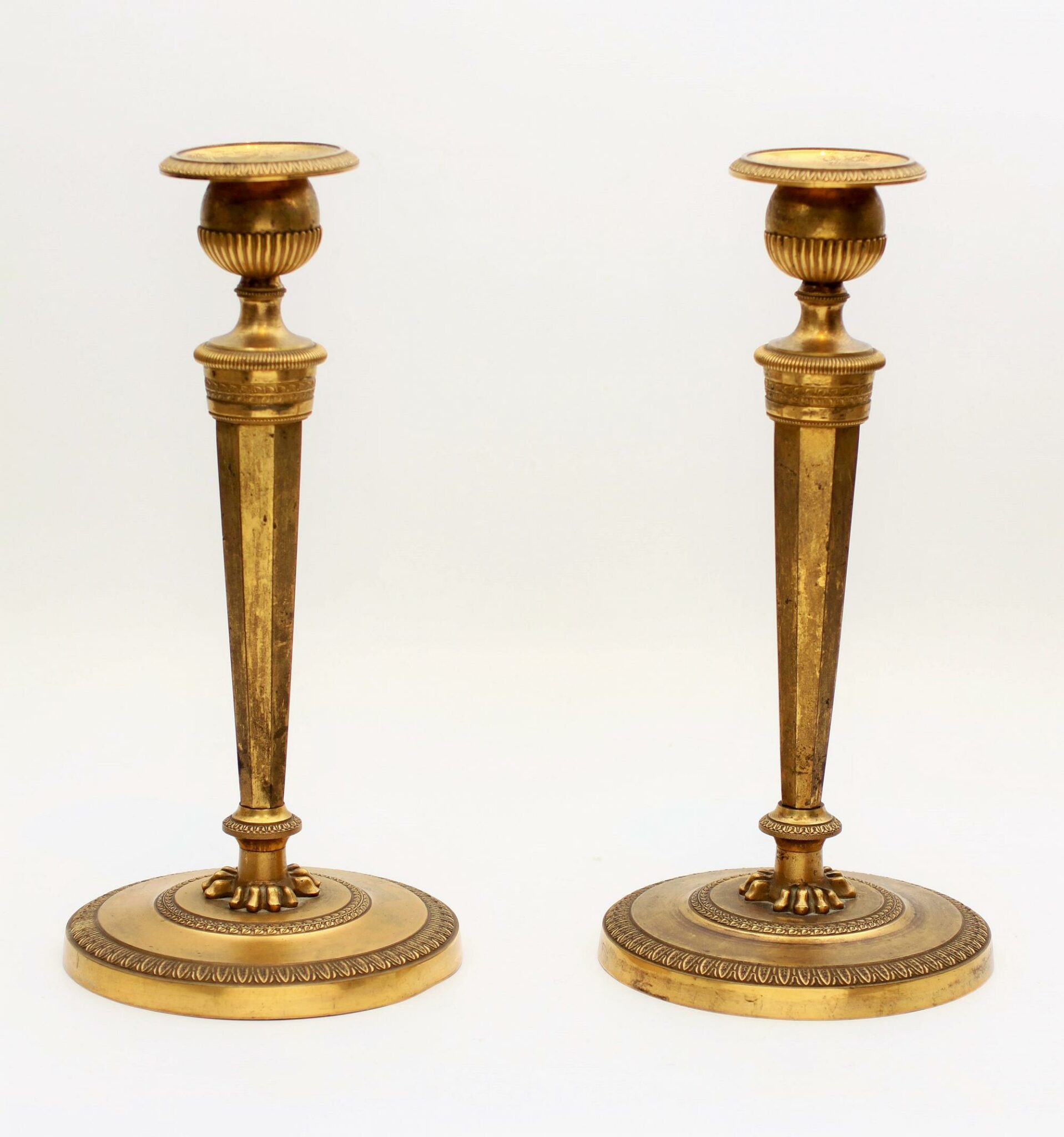 A pair French empire fire-gilt candlesticks, circa 1800 - Gude & Meis
