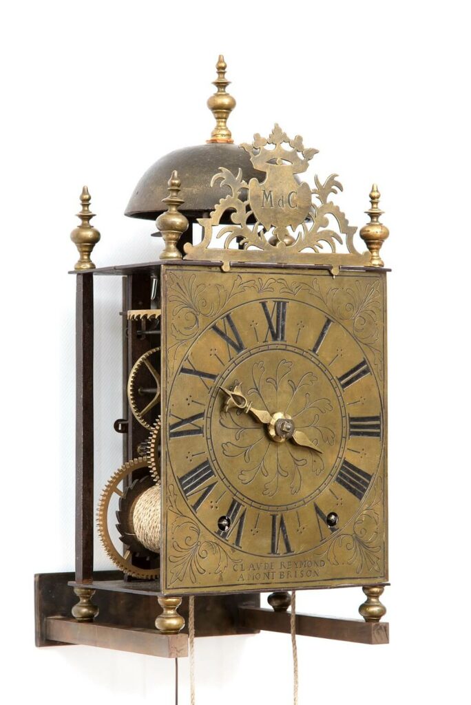 A rare Morbier lantern wall clock, Claude Reynaud, circa 1730 - Gude & Meis