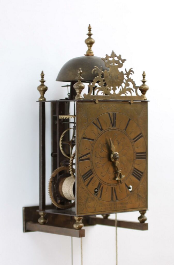 A rare Morbier lantern wall clock, Claude Reynaud, circa 1730 - Gude & Meis