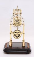 An English brass skeleton timepiece, Thelwell Manchester circa 1860 ...