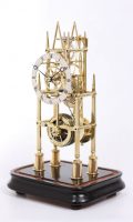 An English brass skeleton timepiece, Thelwell Manchester circa 1860 ...