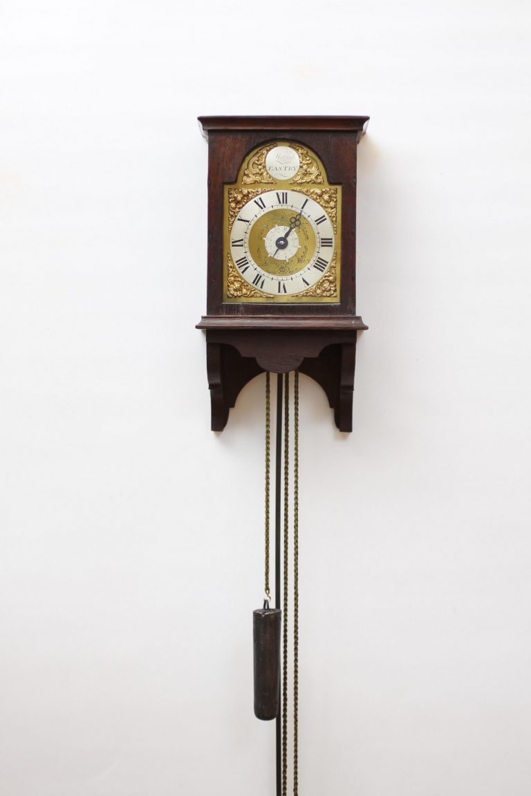 A small English oak hood clock by Marsh Eastry, circa 1750 - Gude & Meis