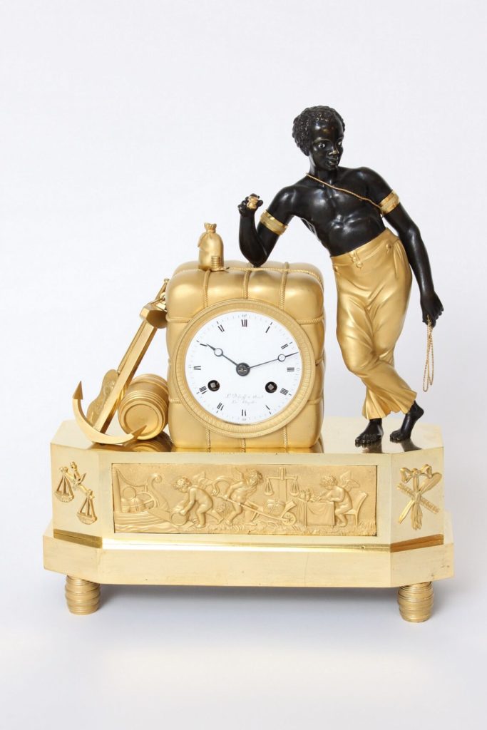 A French Empire ormolu and bronze 'au bon sauvage' mantel clock, circa ...