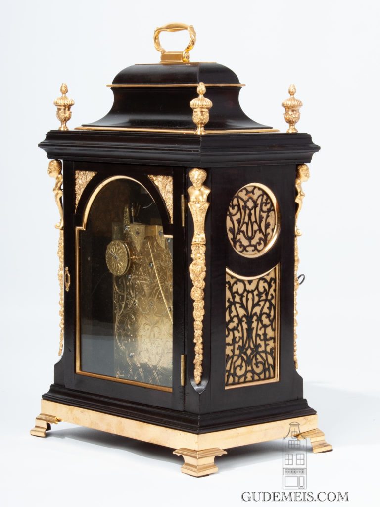 A small Dutch ebonized table clock with date and moon phase, F. Van ...