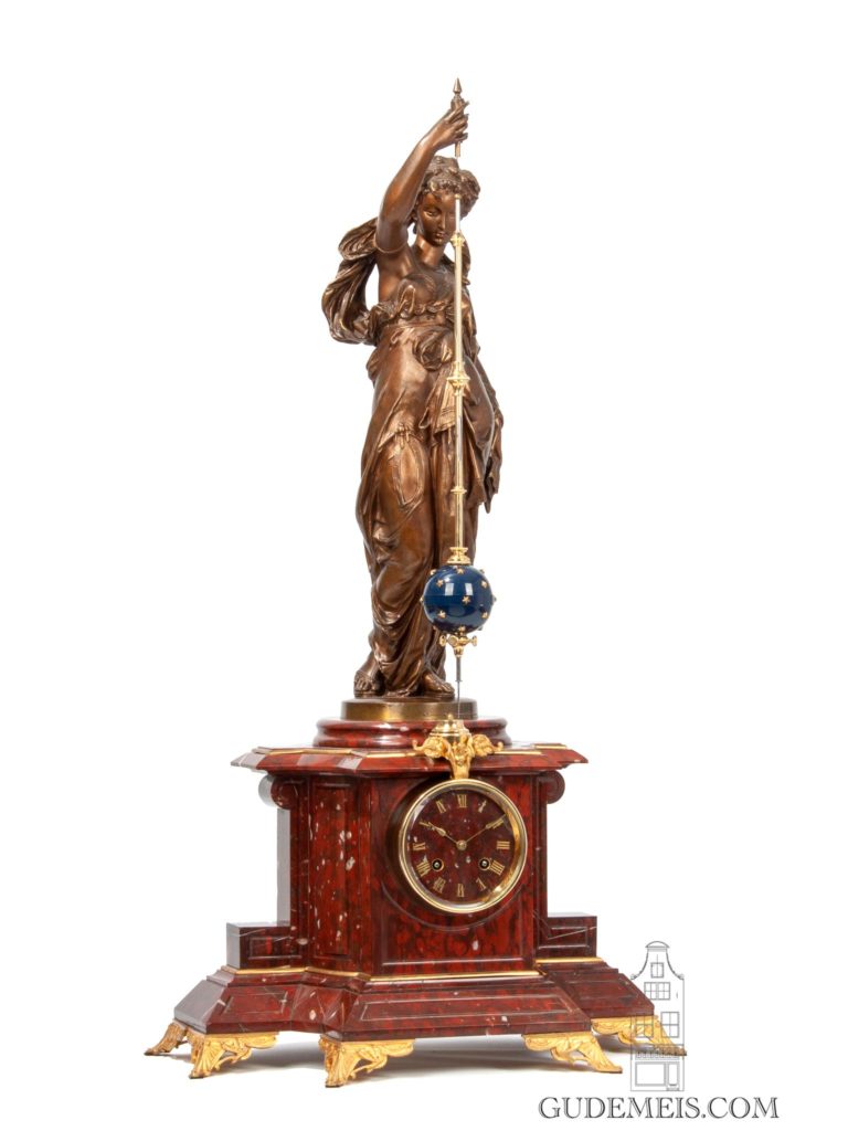 A large French Napoleon III bronze mystery clock with conical pendulum ...