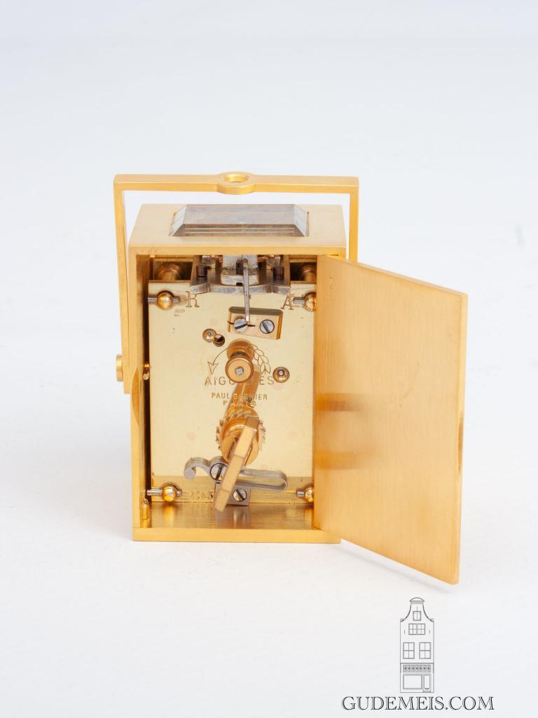 Een miniatuur Frans verguld messing reisklokje, Paul Garnier, circa ...